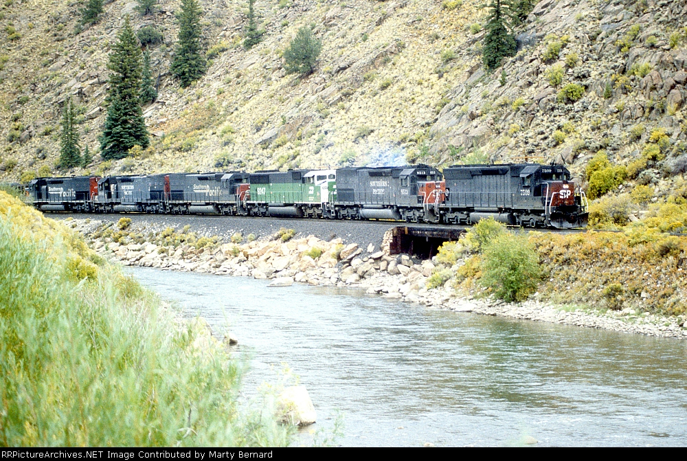 SP 7509 and 8513, BN 9247, SP 9400, 6848, and 8350 With SB Coal Unit Train Along the Arkansas River